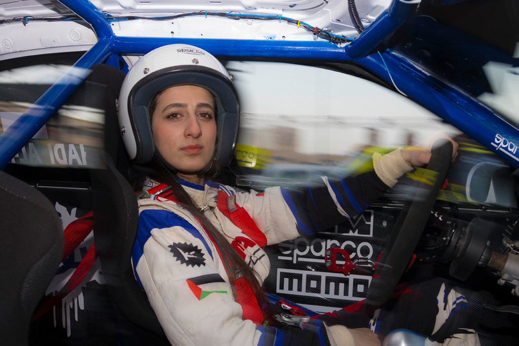 Meet the Racecar Driver Leaving Stereotypes in the Dust - CARE