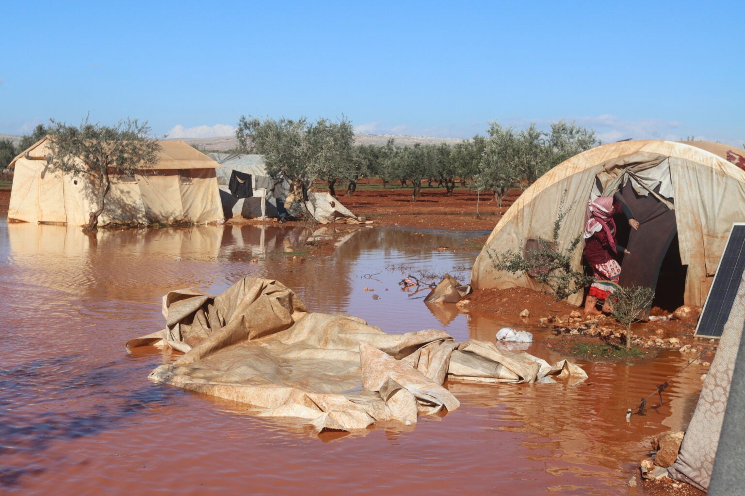Photos: Destructive Flooding Compounds Nearly 10 Years of Conflict for ...